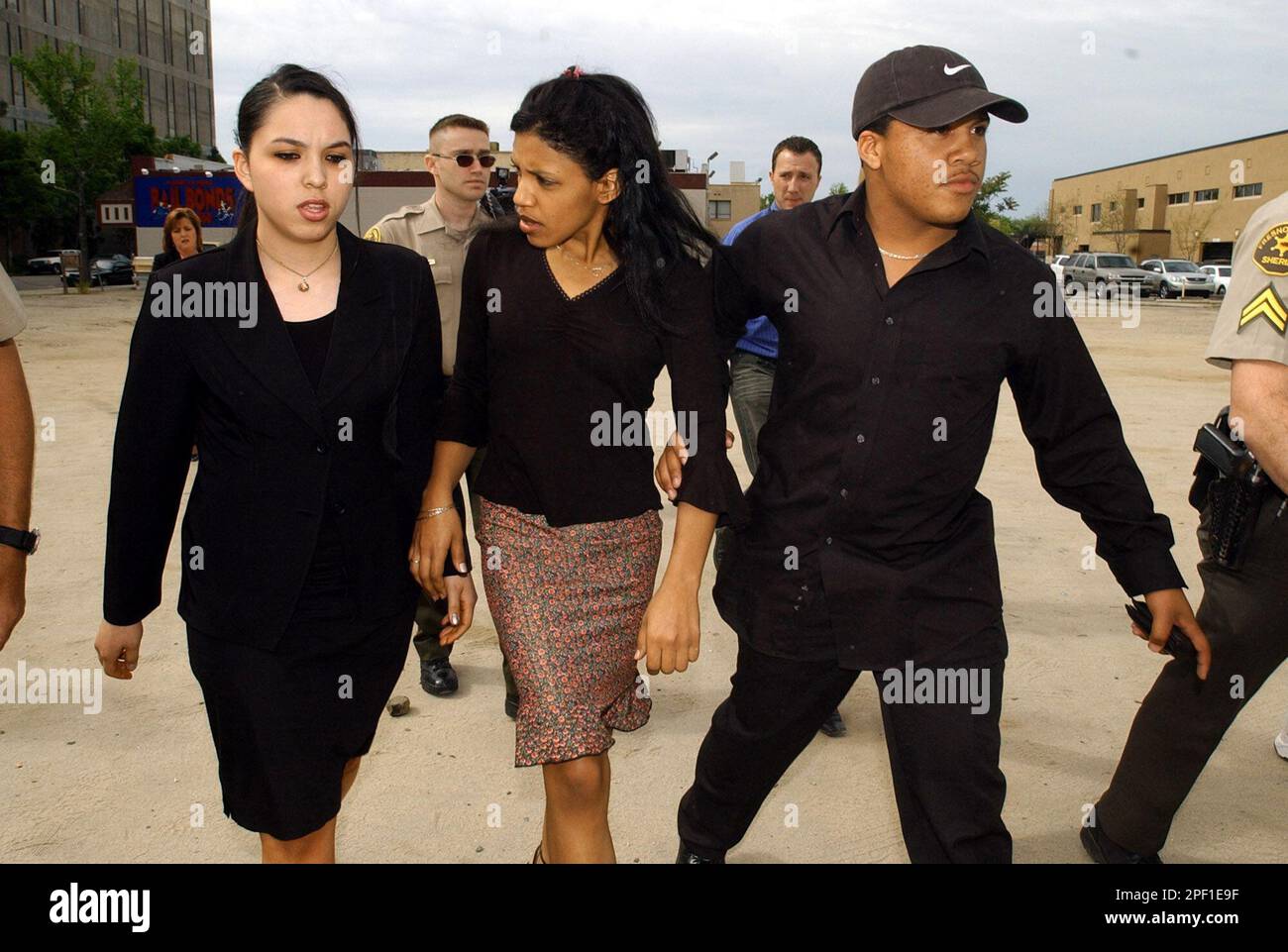 Family members of Marcus Wesson, Rosie Solorio, left, Kiani Wesson ...
