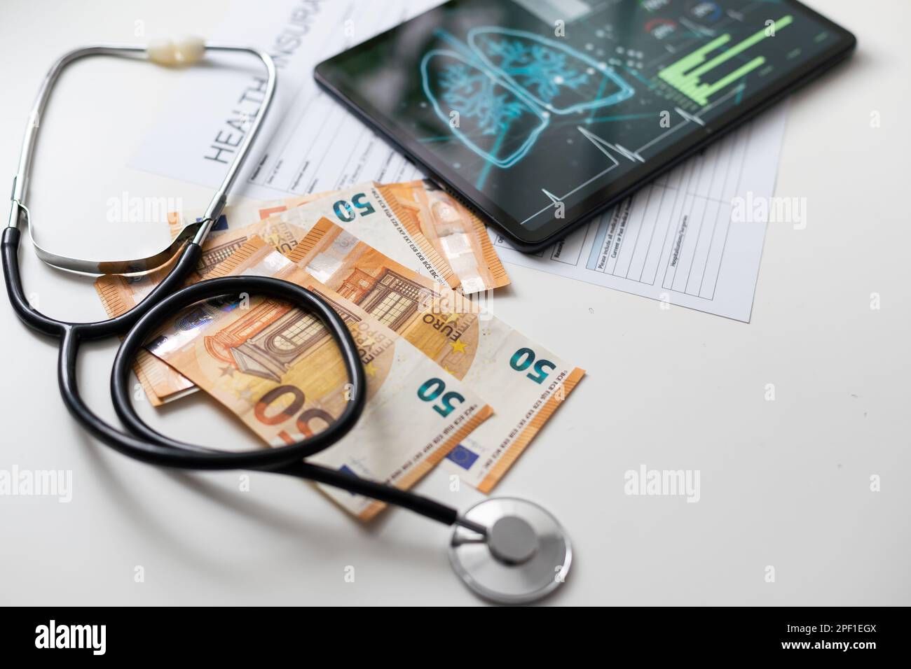 Modern social health insurance program. Tablet computer with healthcare ...