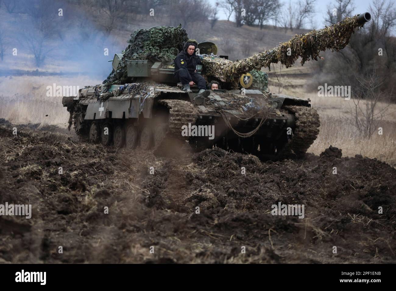 Ukrainian army tank is driven as soldiers check the readiness of ...