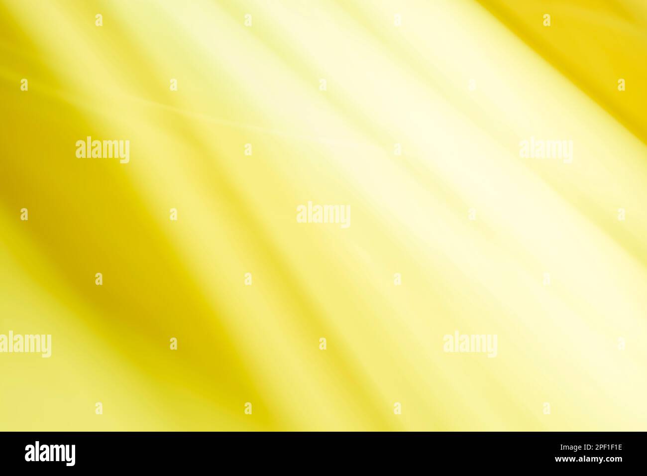 Abstract yellow background with smooth lines and rays, soft gradient ...