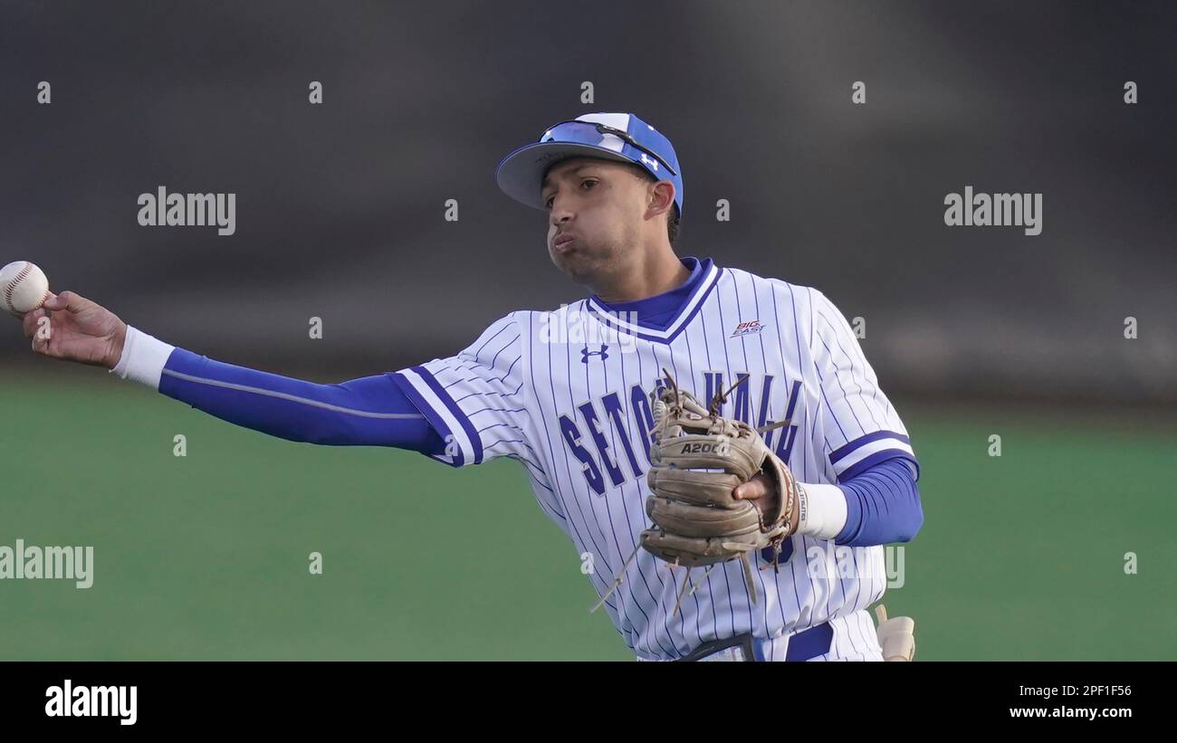 Seton Hall infielder Alex Clyde (5) throws during an NCAA baseball game ...
