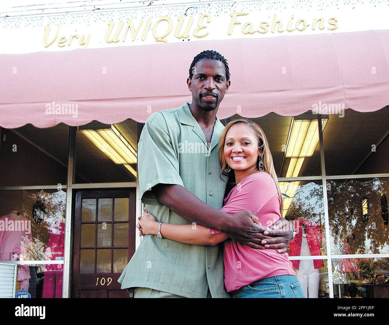 Former NBA star A.C. Green, left, and his wife, Veronique Green, stands ...