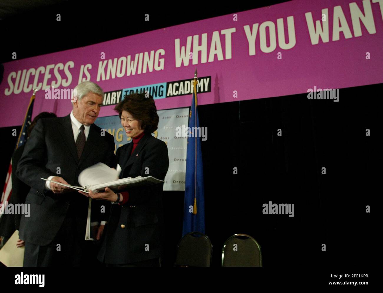 Nevada Gov. Kenny Guinn, left, speaks with U.S. Labor Secretary Elaine ...