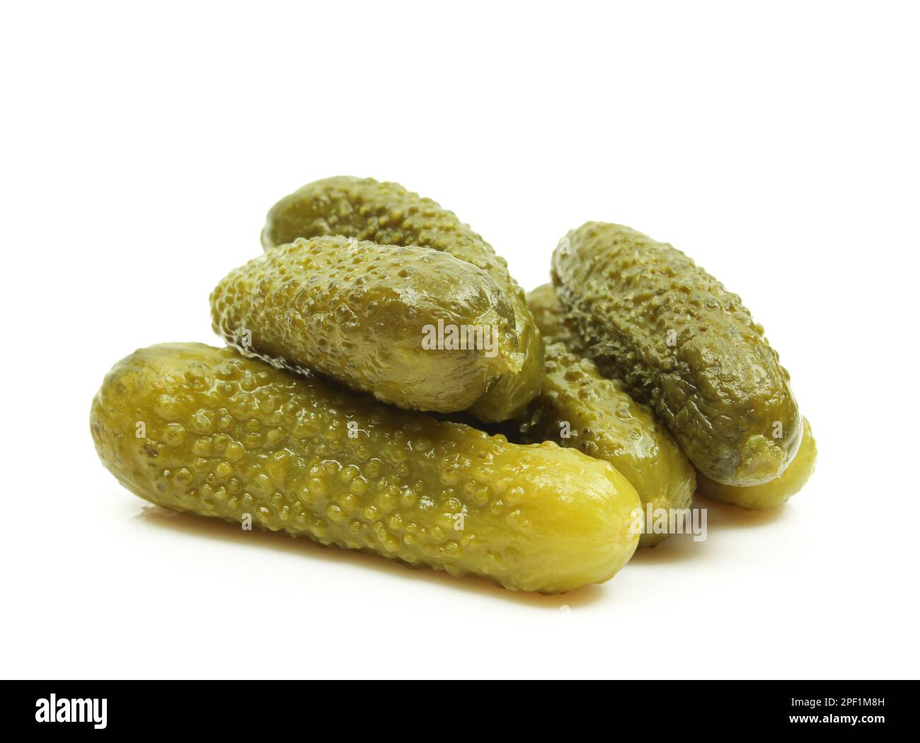 Pile of wet shiny pickles isolated on white background Stock Photo - Alamy