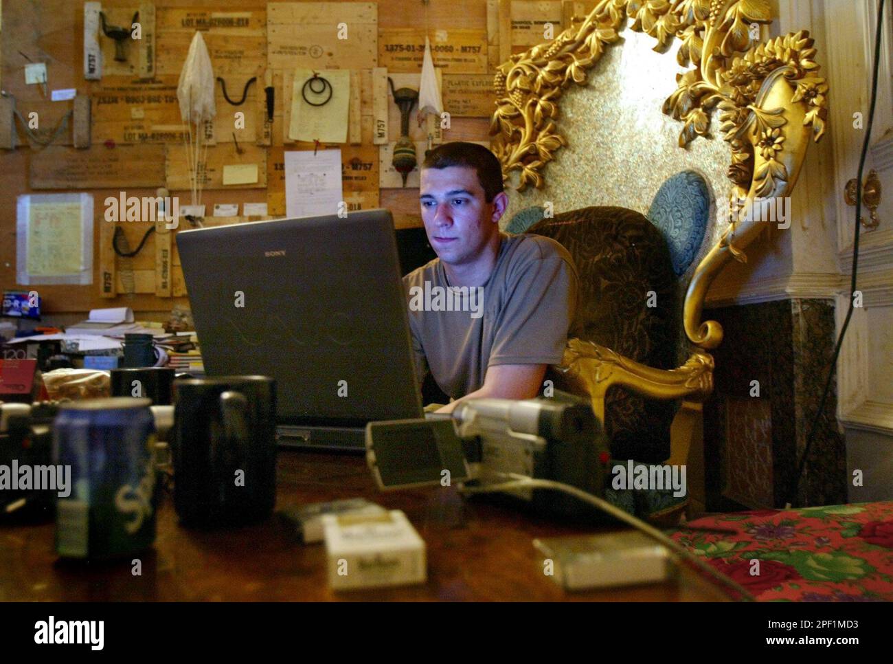 U.S. Army bomb squad member Pfc. Josh Carlegis from Houston, Tx. plays ...