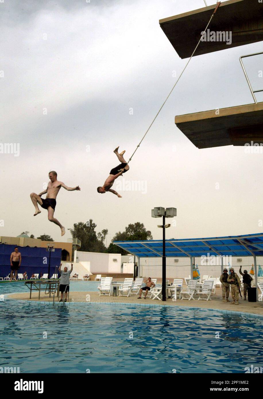 U.S. Army soldiers on thier last two weeks in Iraq relax while jumping ...