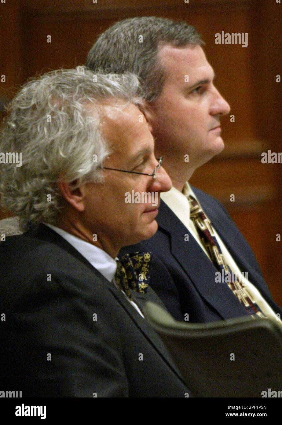 Michael Blagg, right, sits with his attorney, David Eisner at the Mesa ...