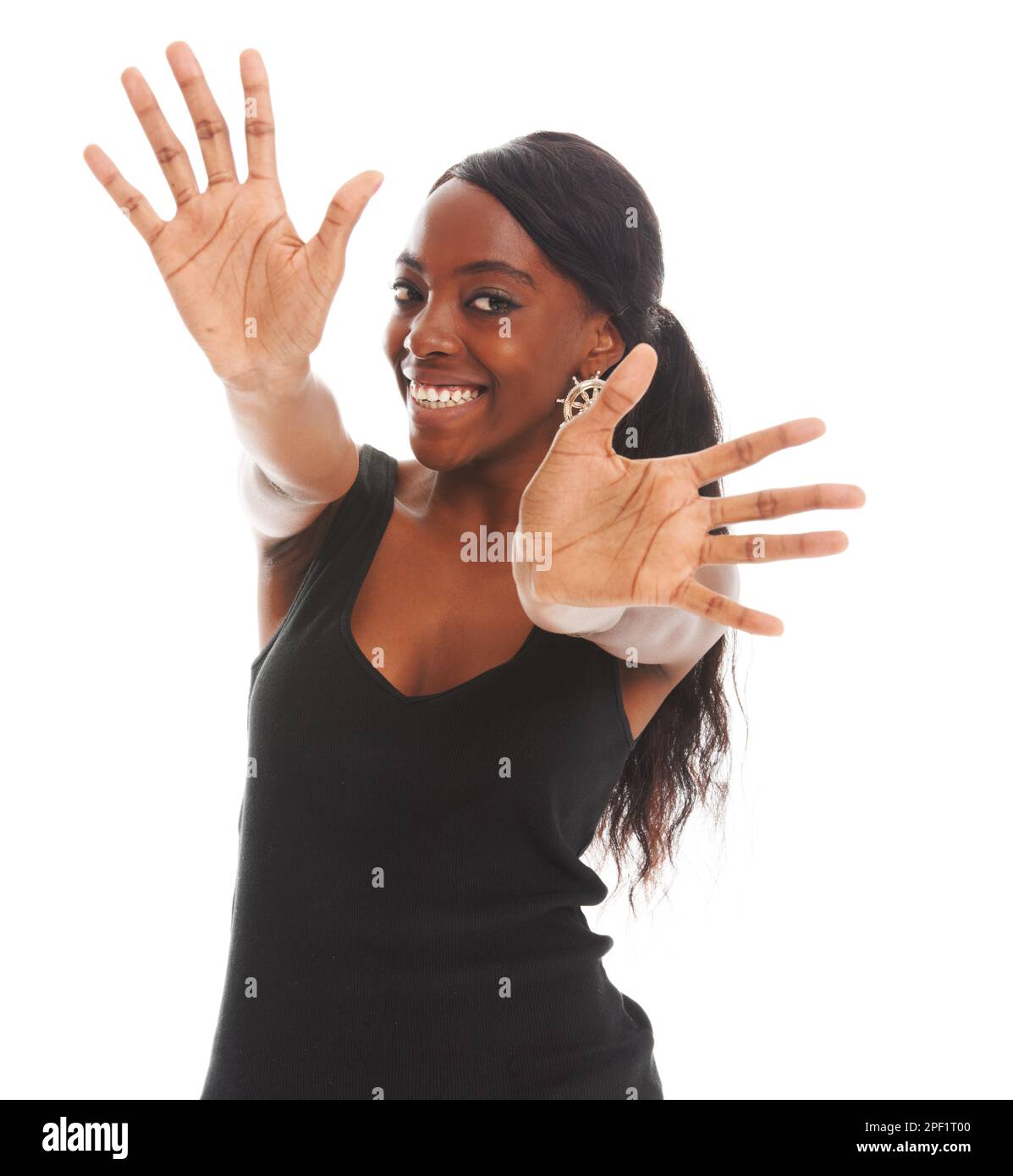 Im feeling good. Happy young woman laughing while stretching out her ...