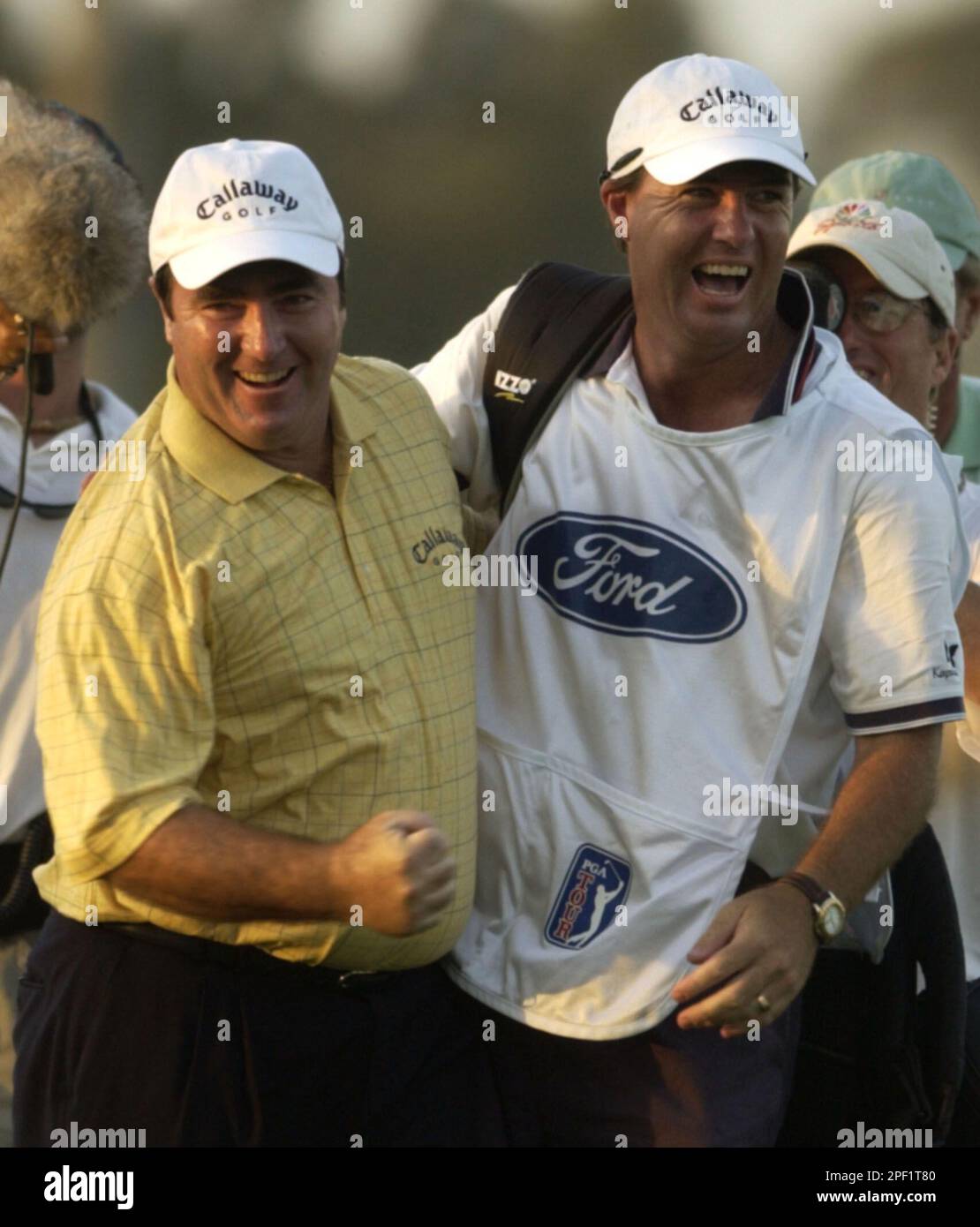 Craig Parry, of Australia, celebrates with his caddie, his brother ...