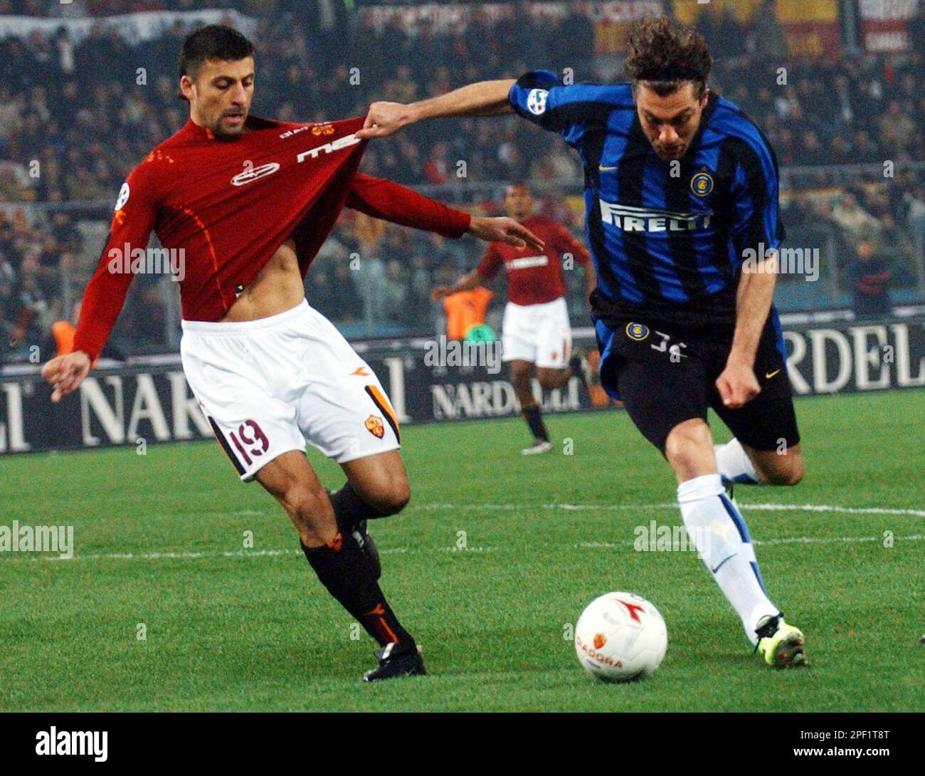 AS Roma's Argentine defender Walter Samuel, left, and Inter Milan's ... AS Roma's Argentine defender Walter Samuel, left, and Inter Milan's ...
