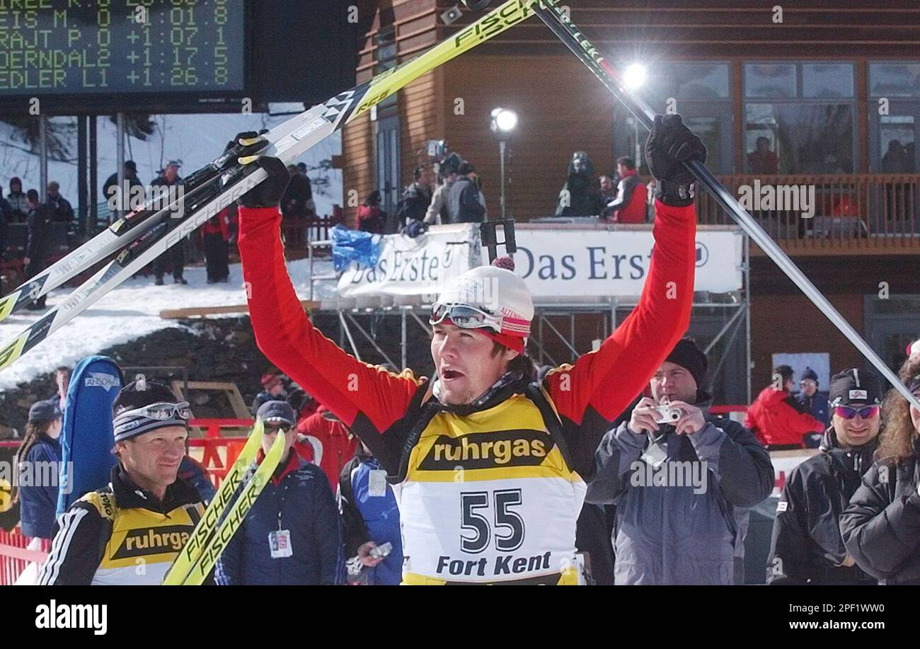 Michael Rosch of Germany cheers to the crowd after coming from the back ...