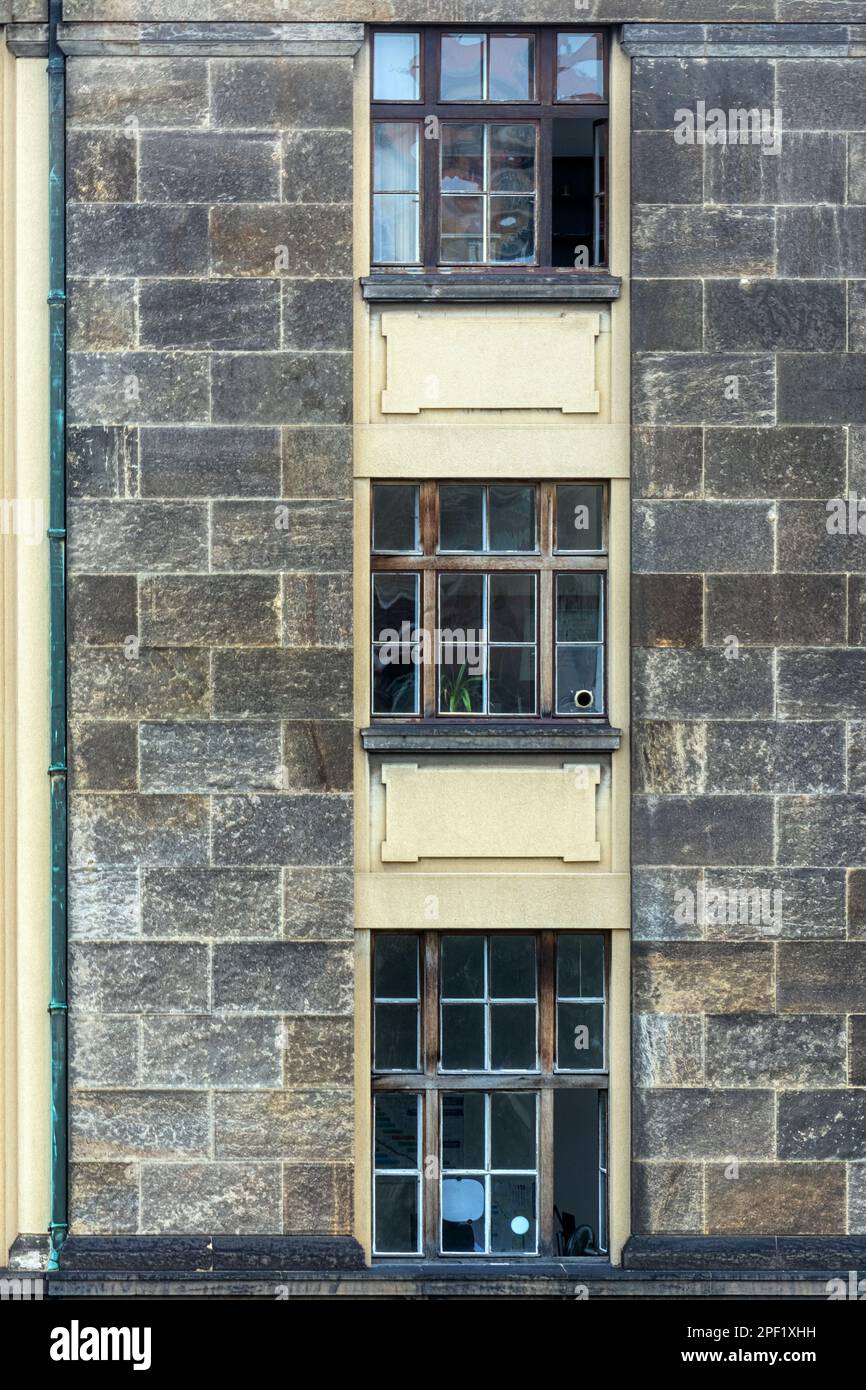 Three rectangular windows located vertically above each other on the ...