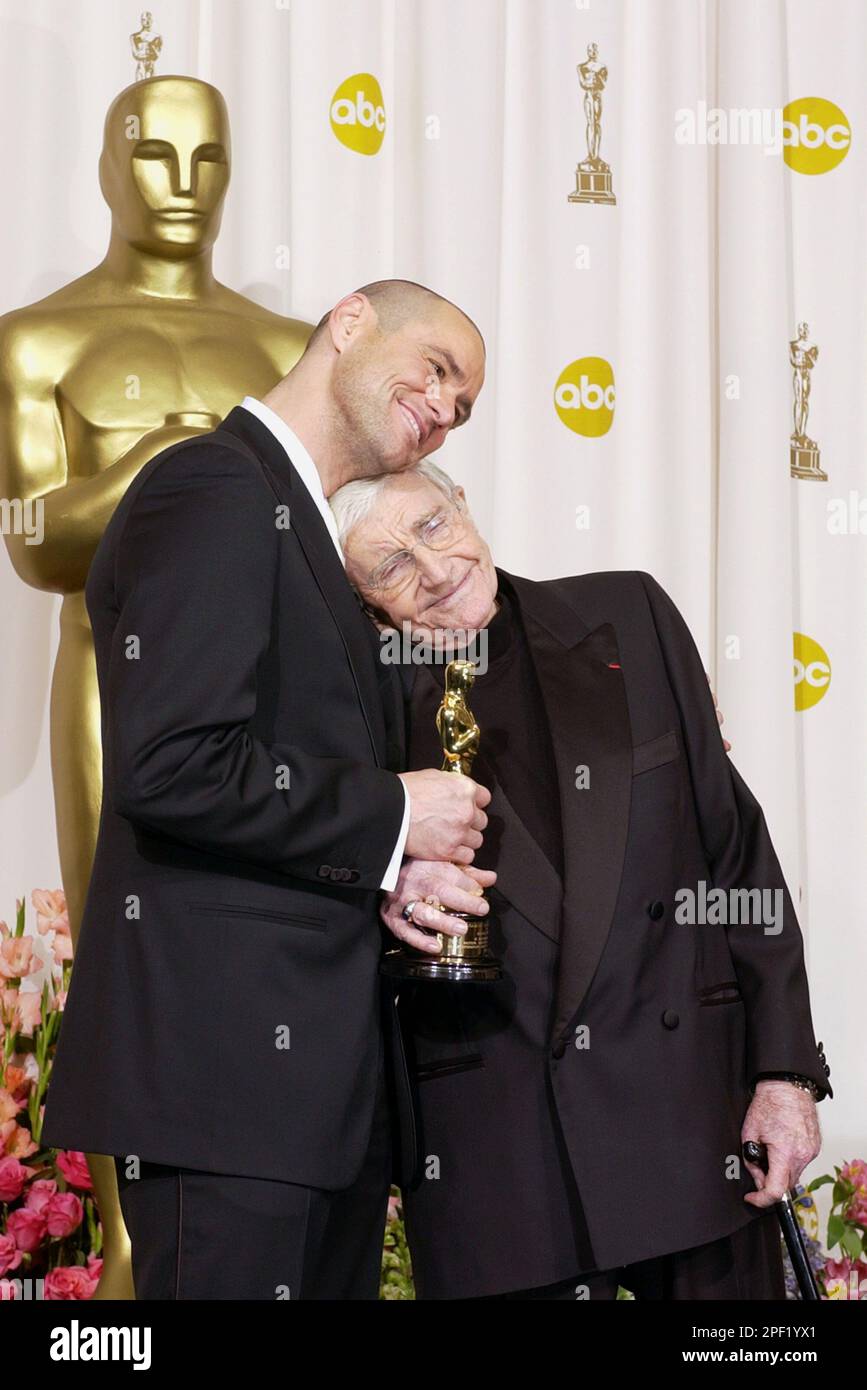 Blake Edwards, right, poses with Jim Carrey after recieving an honorary ...