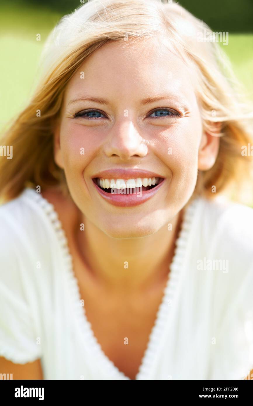 Shes got a fresh-faced natural beauty. Beautiful young woman laughing ...