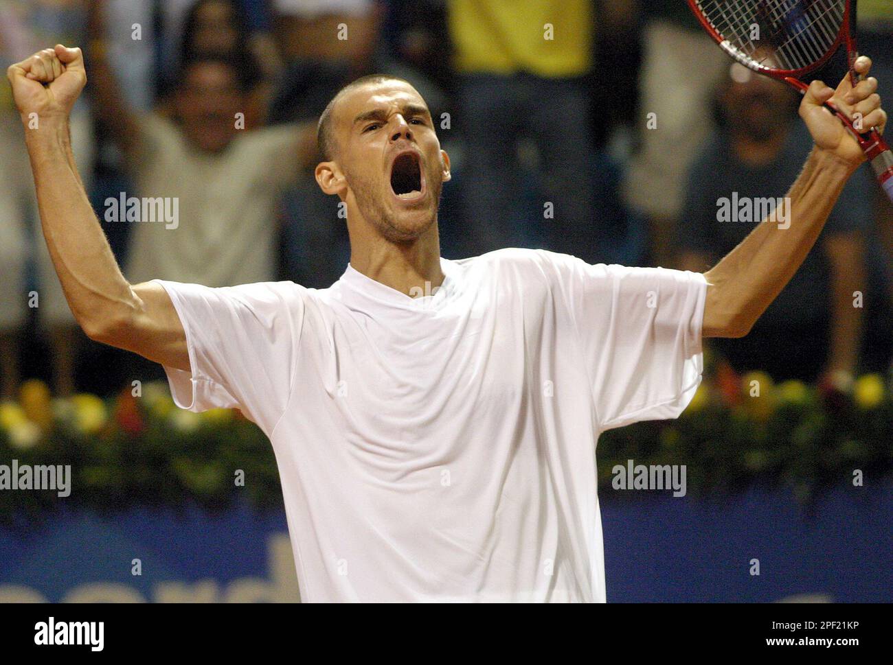 Gustavo Kuerten of Brazil celebrates his victory against Franco ...