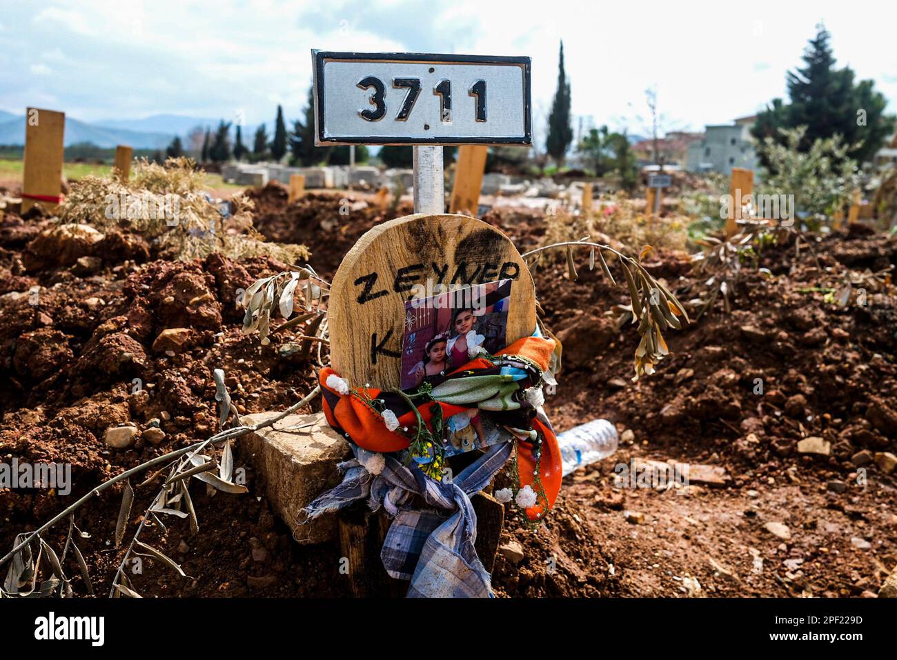 A grave of a deceased person with a number seen at the graveyard. One ...