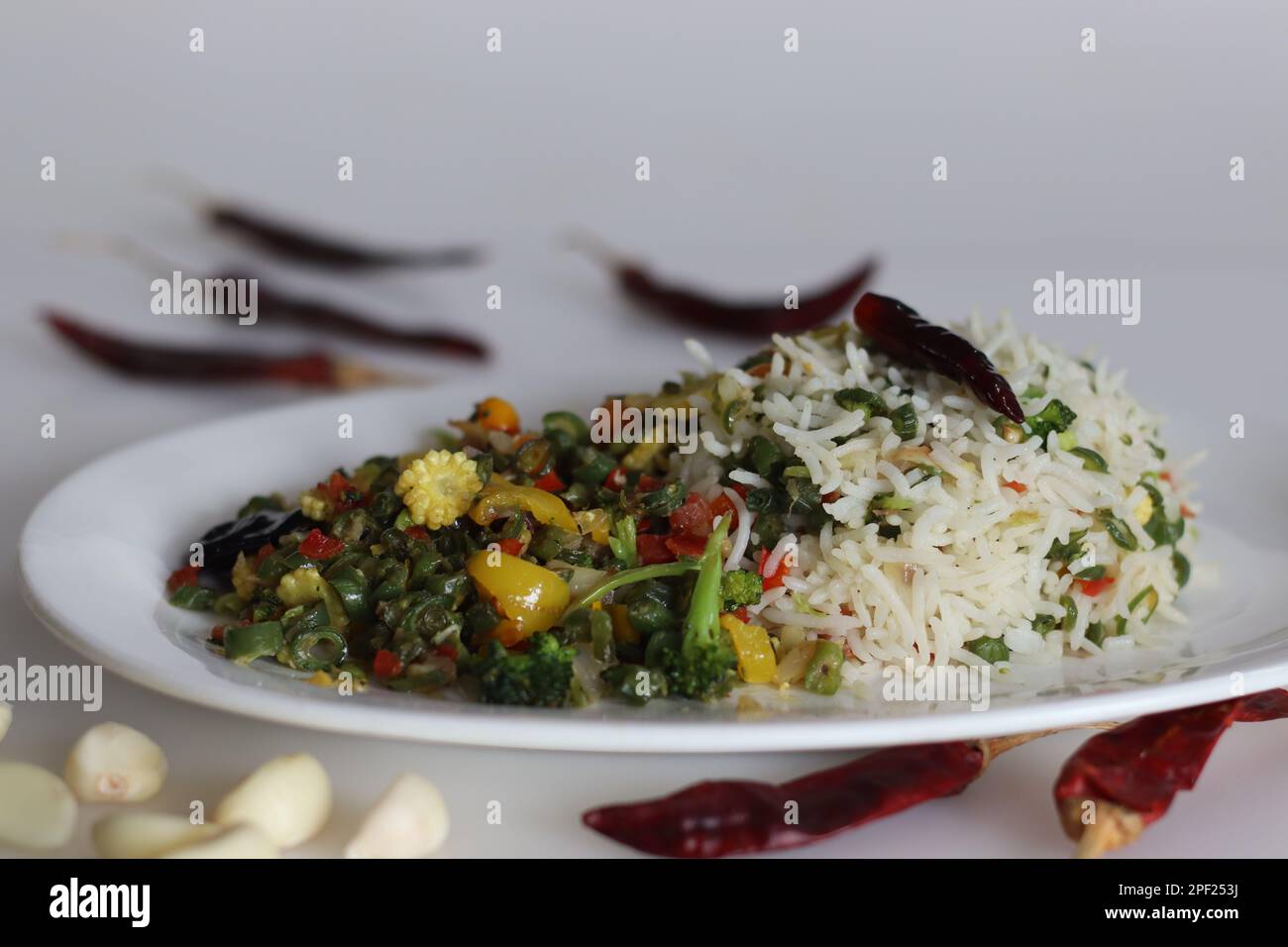 Chili garlic veg rice. Chilli garlic mix vegetable rice. A garlic ...