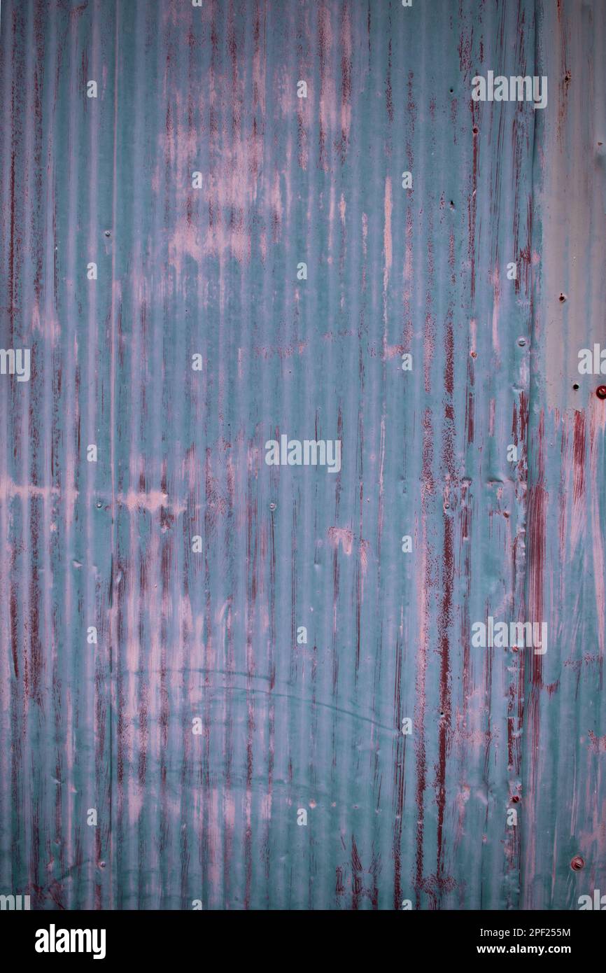 Artistic blue streaked corrugated metal warehouse siding Stock Photo ...