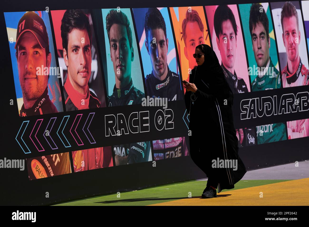 A Saudi woman arrives to the paddock of the Formula On Saudi Arabian ...