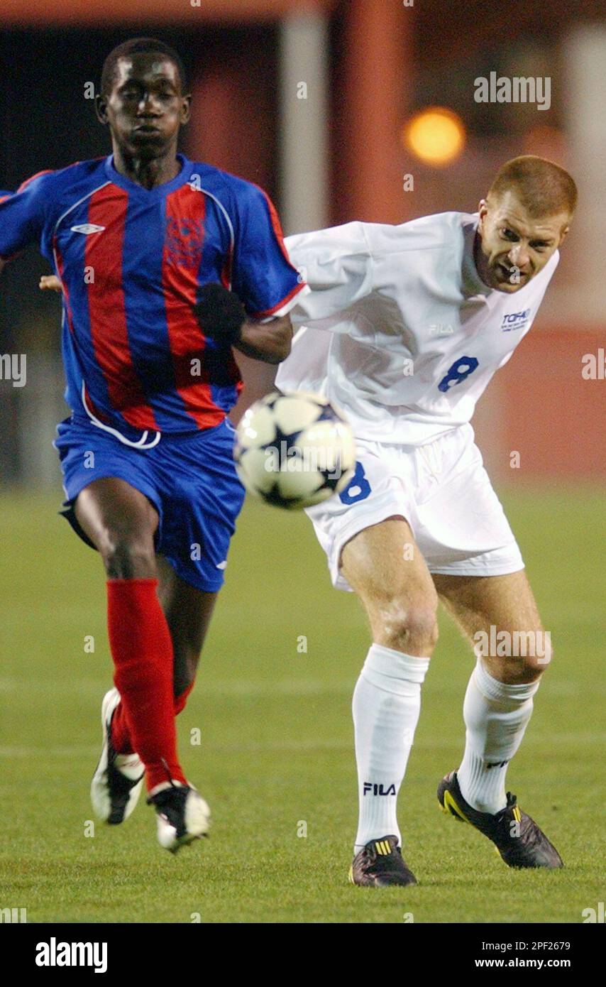 Haiti's Corriolan Wadson, left, battles Turks and Caicos' C. Look (8 ...