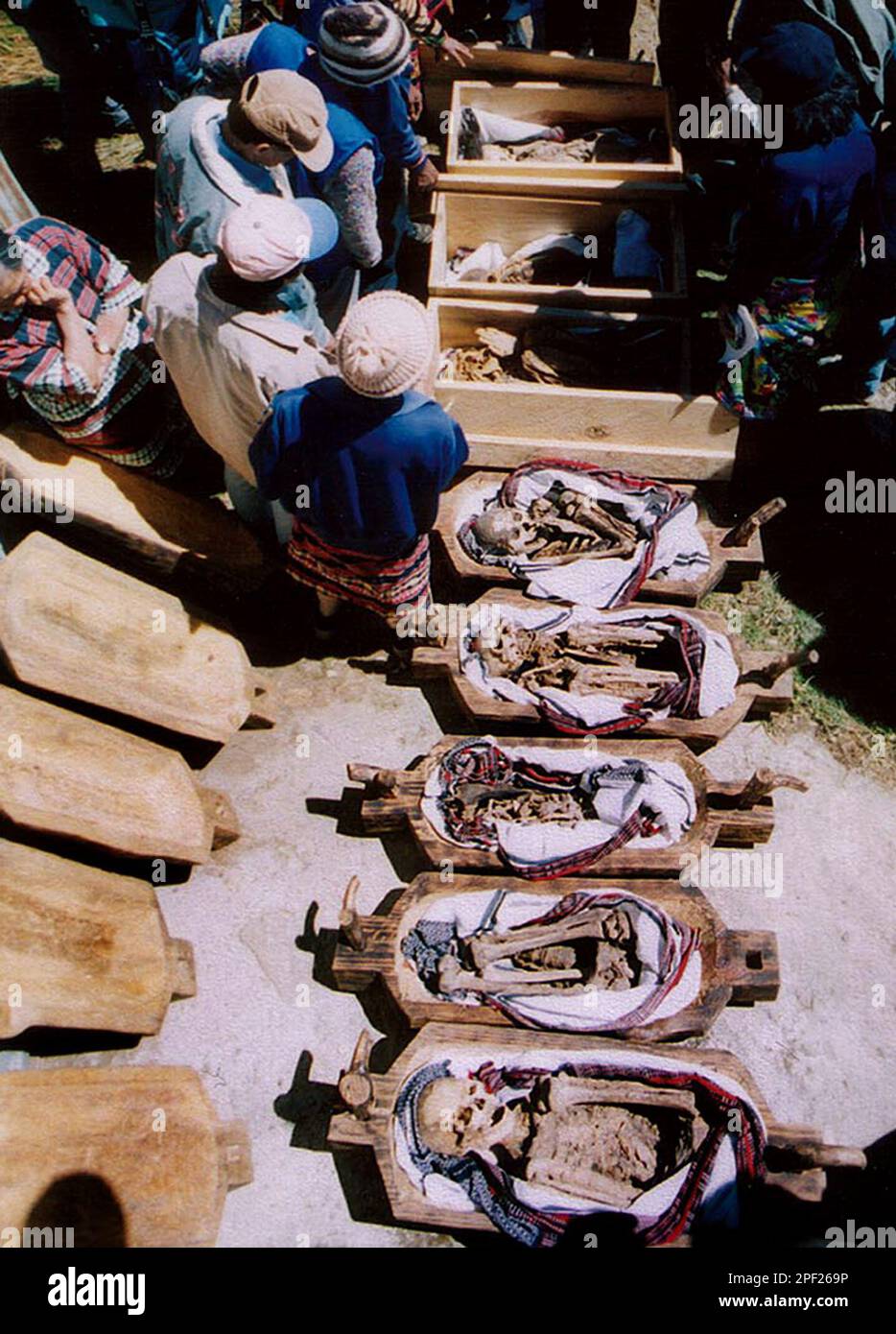 Filipino villagers look at eight mummies before they are returned to ...