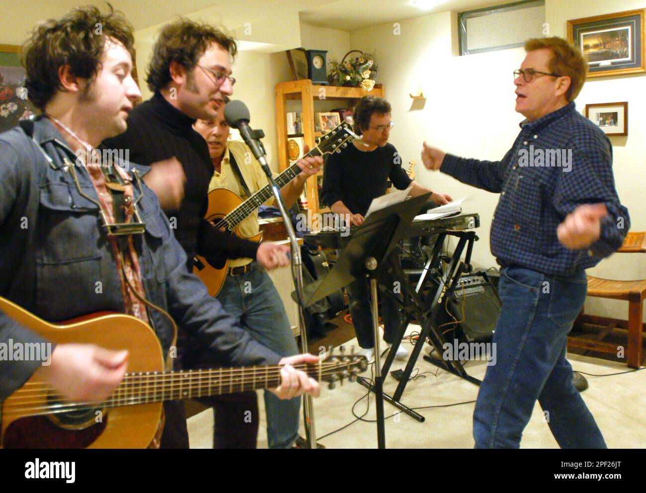 ** ADVANCE FOR WEEKEND FEB. 21-22 ** Kevin Odegard, right, and ...