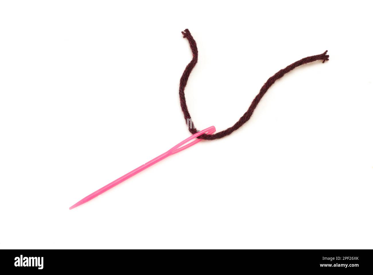 Pink plastic yarn needle isolated on white background. Large-Eye ...