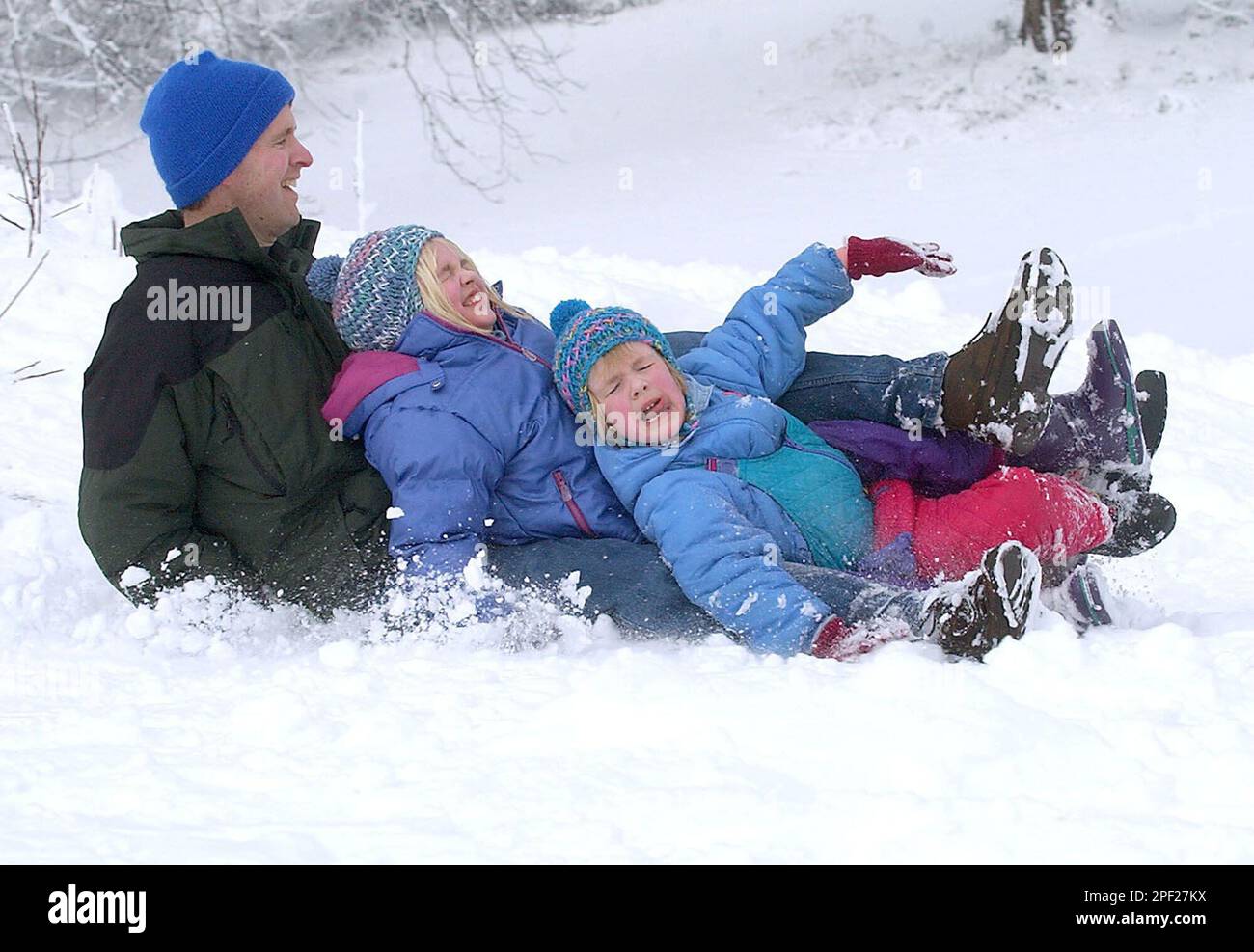 Robert Tolar, left, and his daughters, Erin, center, and Elizabeth ...