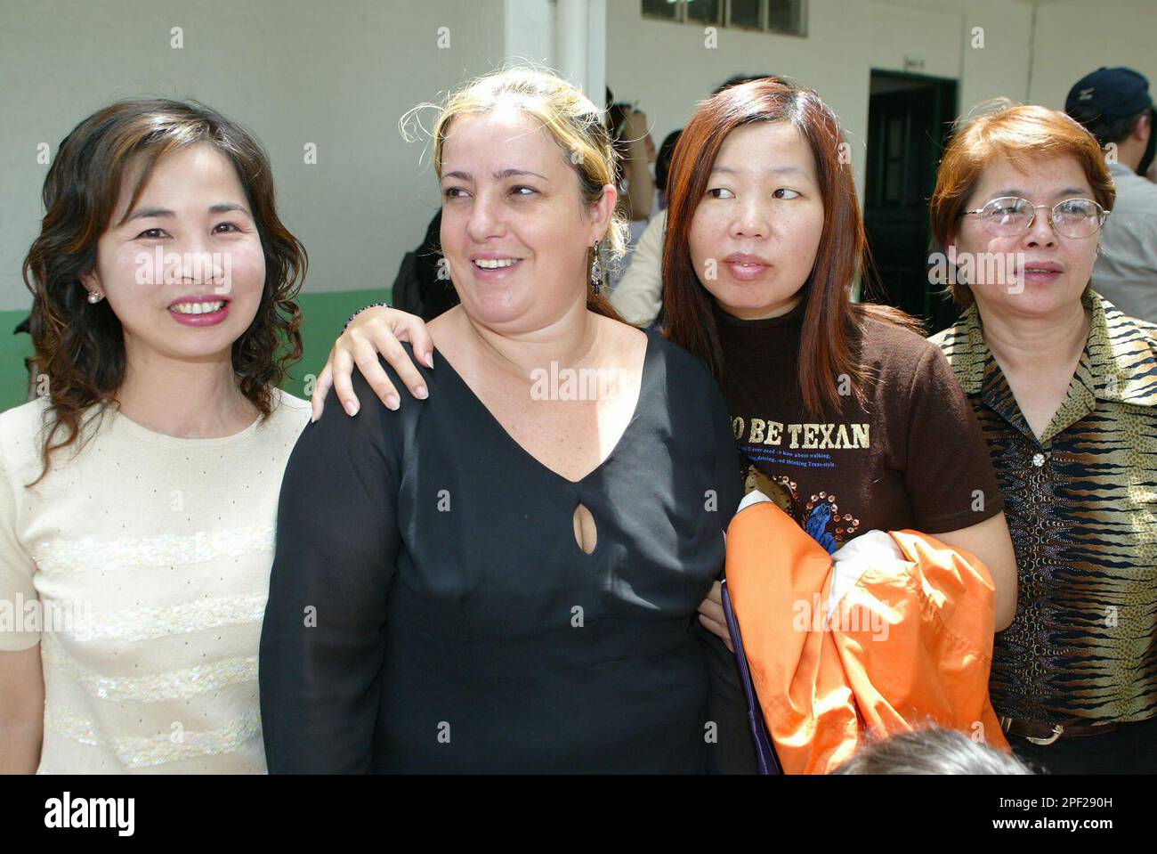 Patricia Ergui, second from left, Brazilian aunt of Iruan Ergui Wu ...