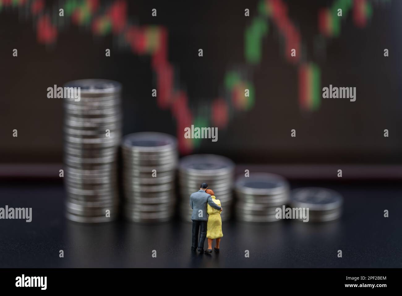 Money, Financial, Business and Family concept. Couple Miniature figures ...