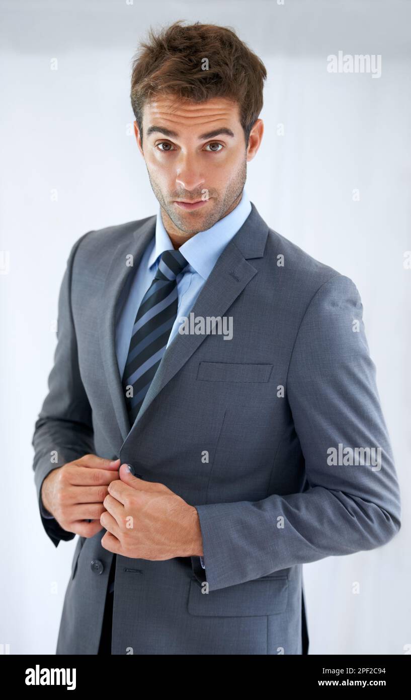 The modern professional. a handsome young businessman at work Stock ...