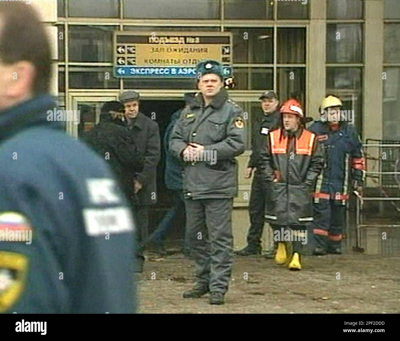 Rescue workers outside a metro station in Moscow in this frame from TV ...