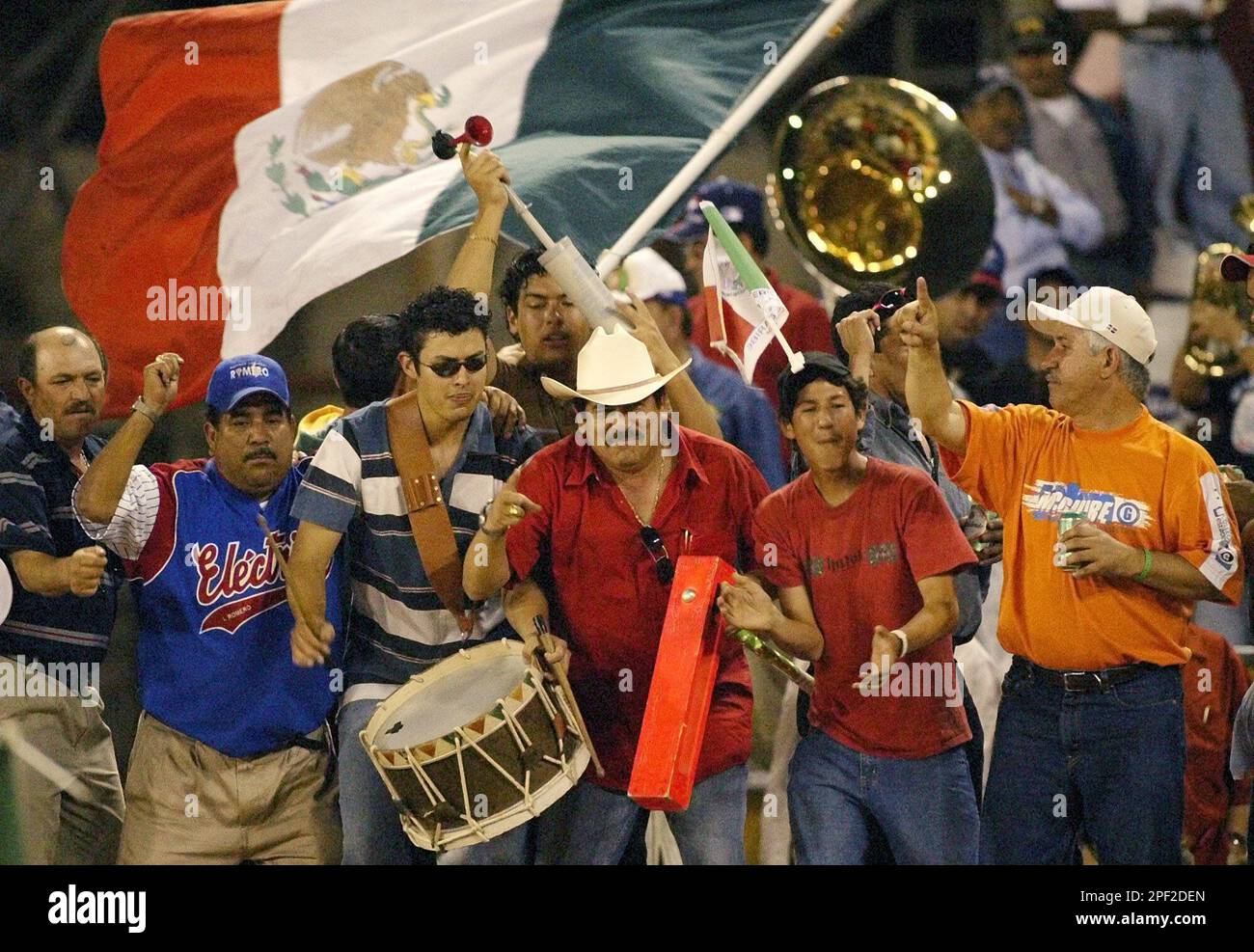 Mexican baseball fans celebrate after there team defeated Puerto Rico ...