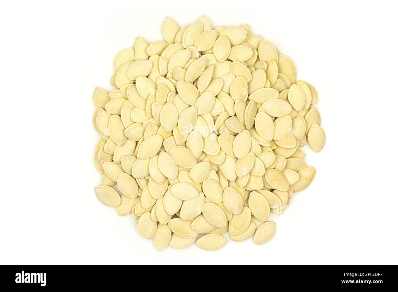 Pile of roasted pumpkin seeds isolated on white background Stock Photo ...