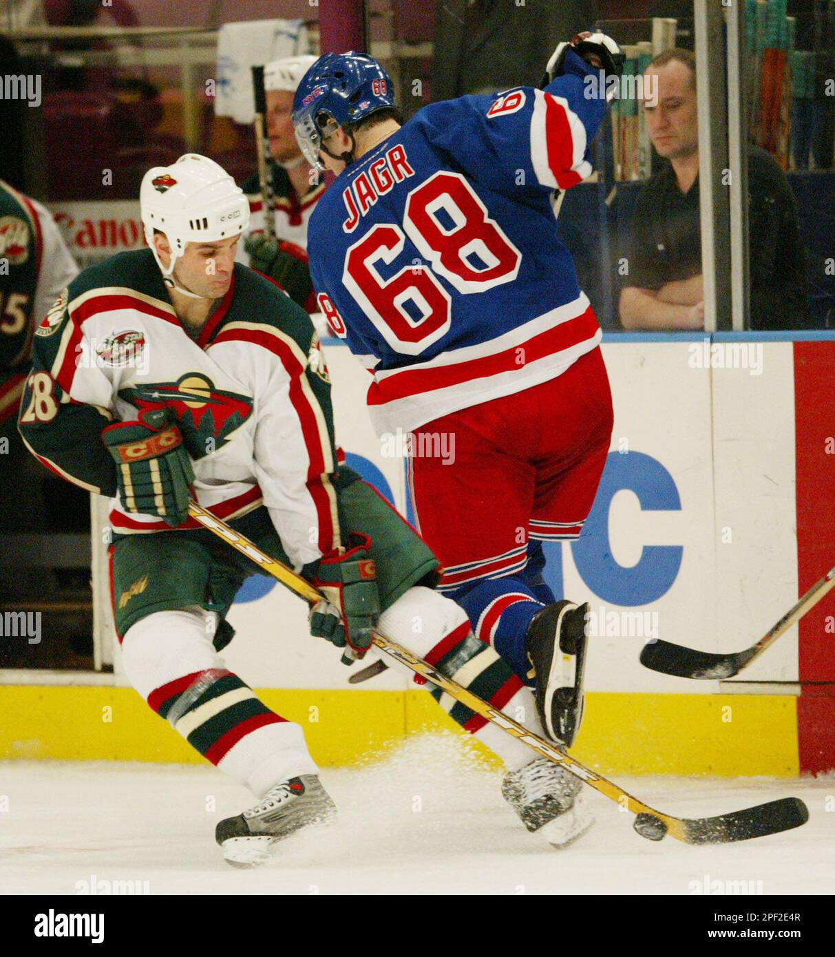 Minnesota Wild's Jason Wiemer (28) trips New York Rangers' Jaromir Jagr ...