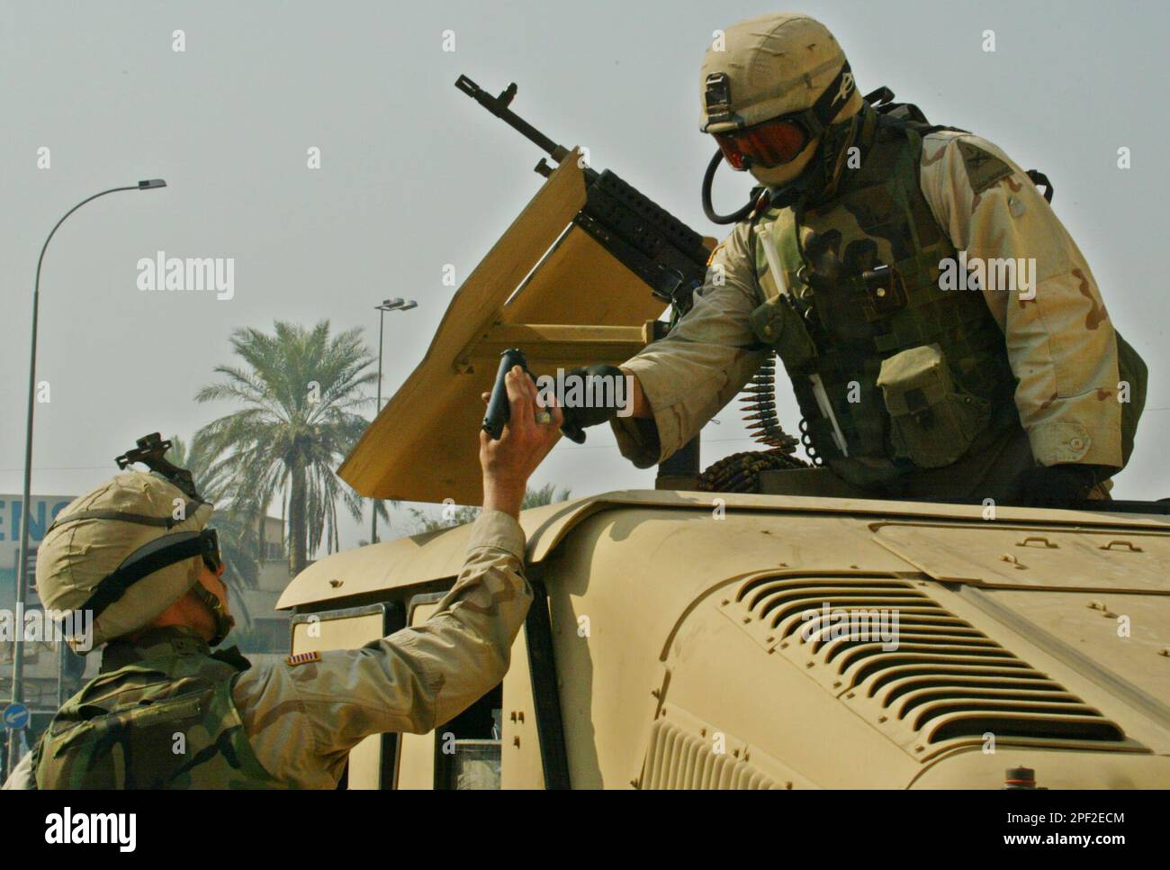 US Army Sgt. John Rhodes (left) of Charlie Company 1-6 Infantry 1st ...
