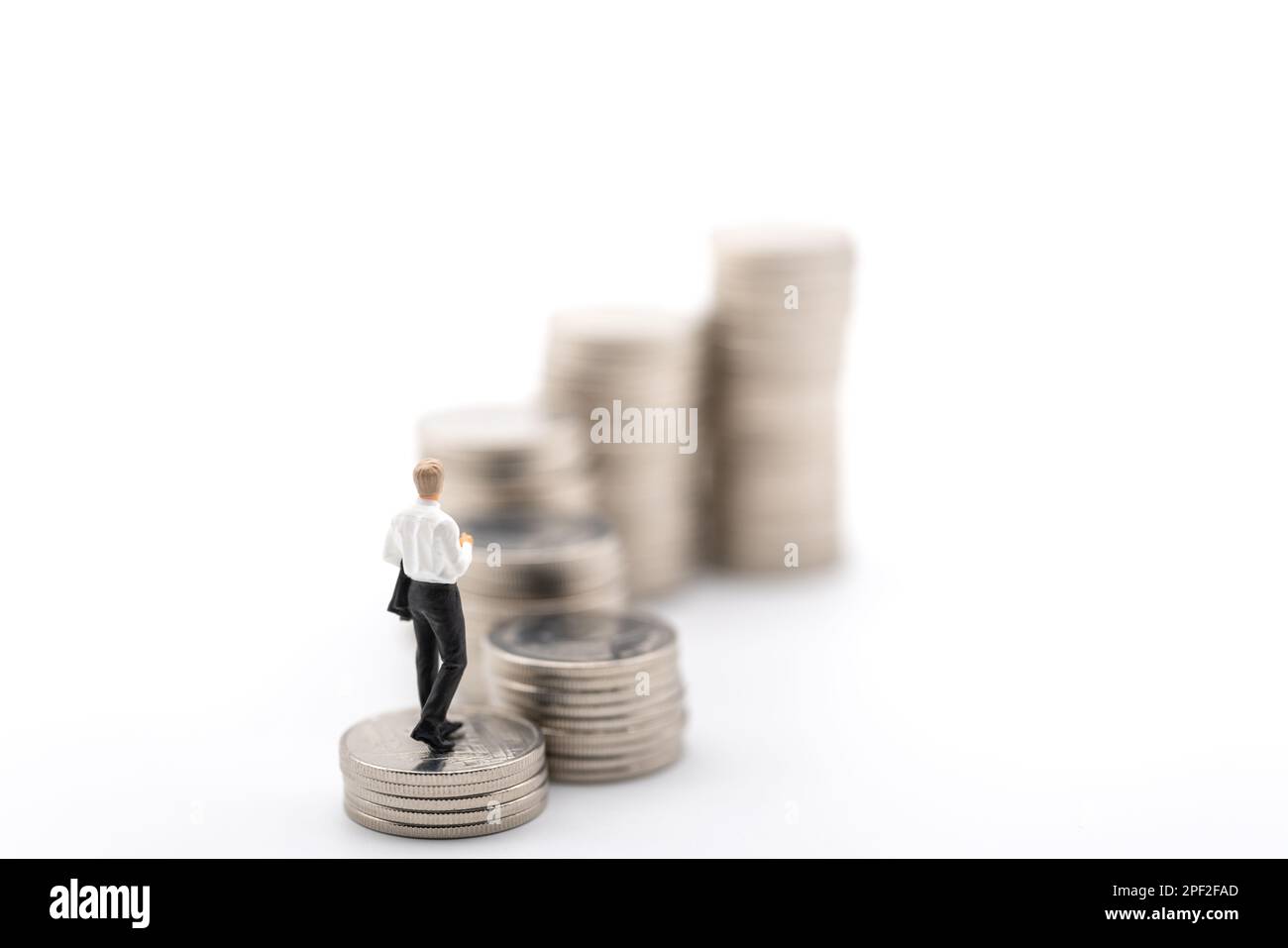 Business, Money Investment and Planning Concept. Businessman miniature ...