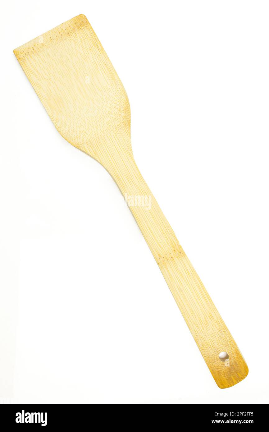 Wooden kitchen spatula isolated on white background Stock Photo - Alamy