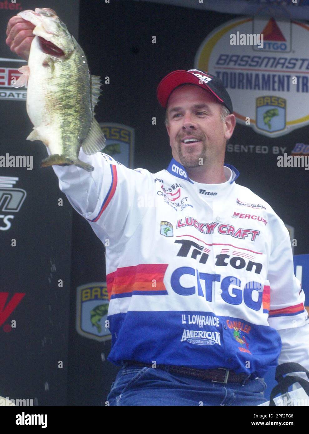 Marty Stone hoists up his biggest catch of the day that helped him take ...