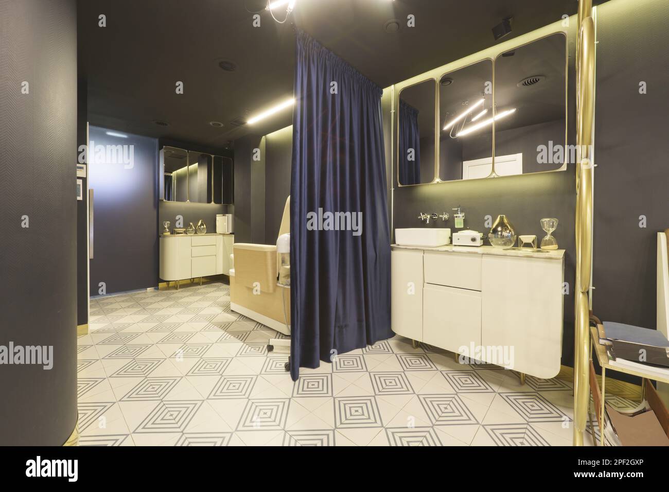 Work areas with curtains and furniture with mirrors in the interior of ...