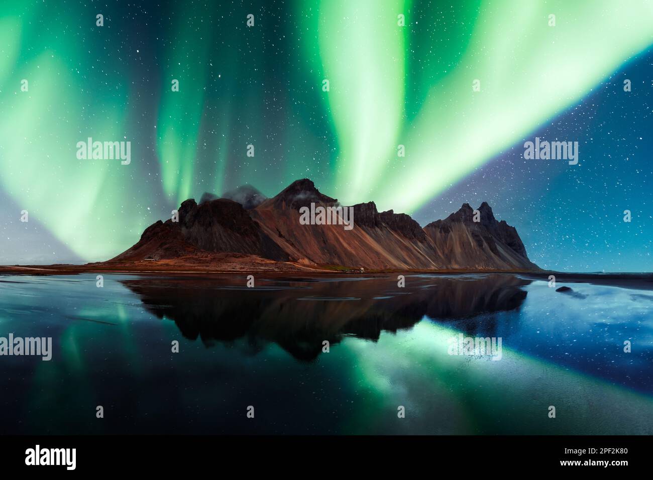 Aurora borealis Northern lights over famous Stokksnes mountains on ...