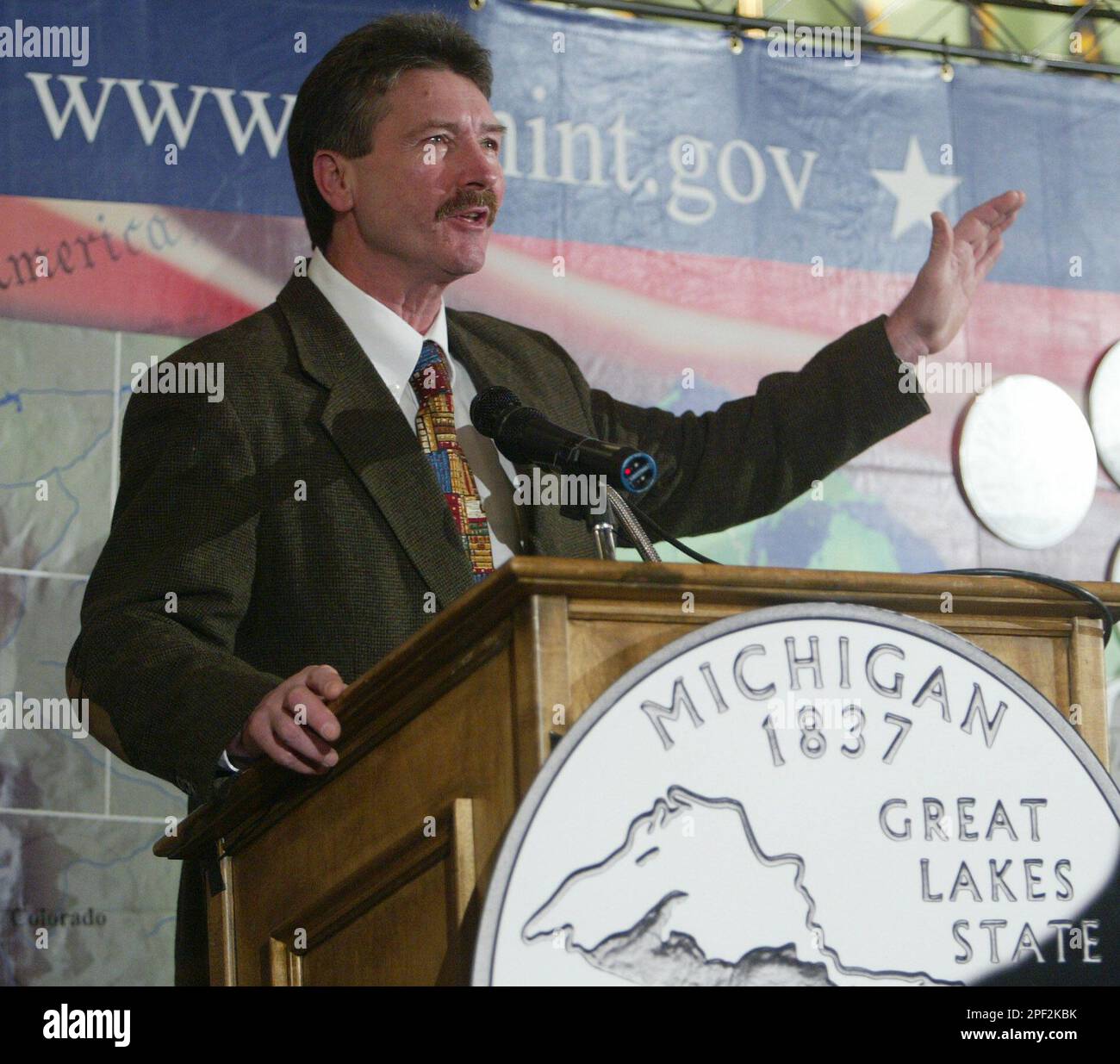 Larry Massie talks about the history of Michigan during a ceremony ...