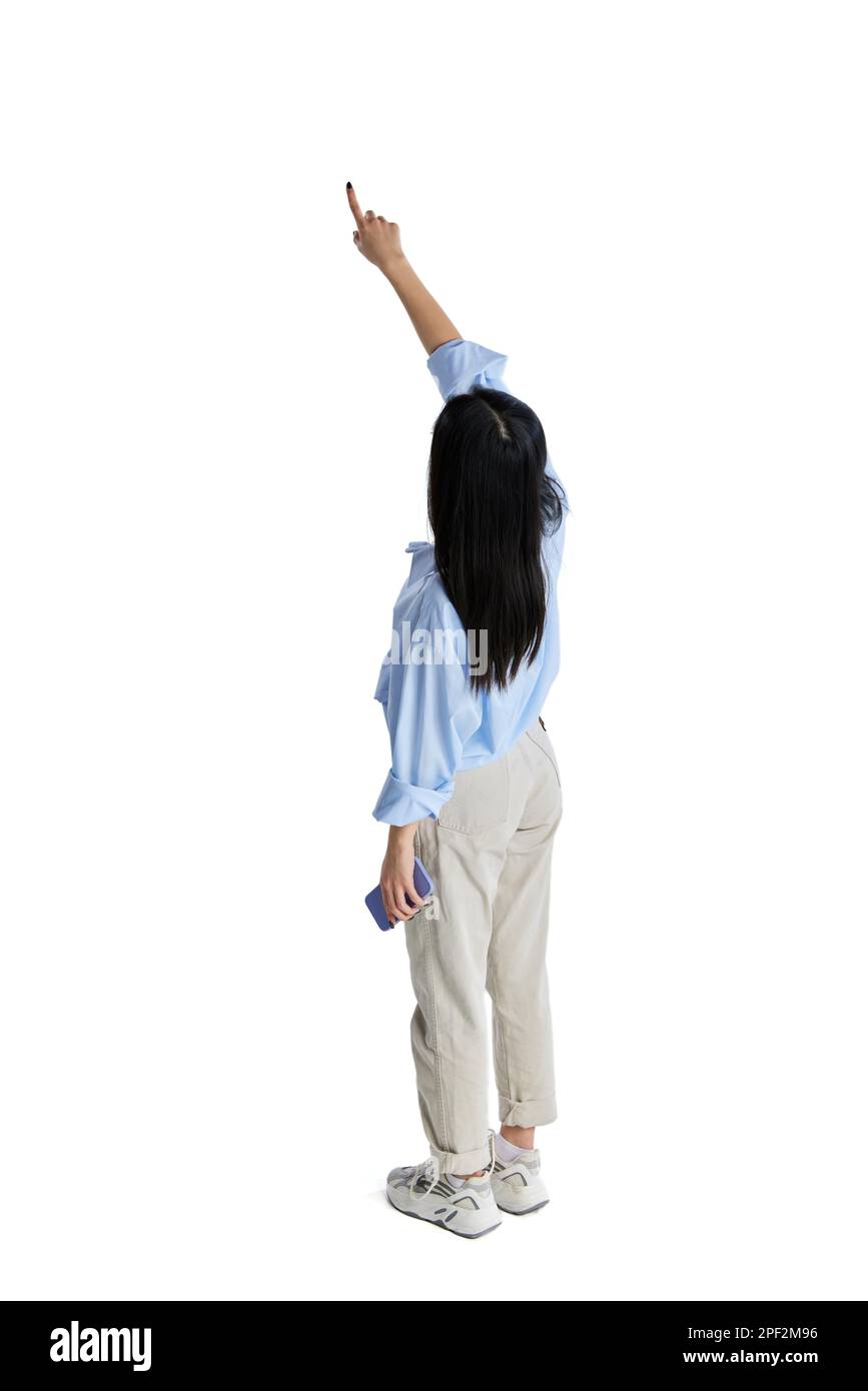 Top isometric back view of young girl in formal wear, shirt pointing ...