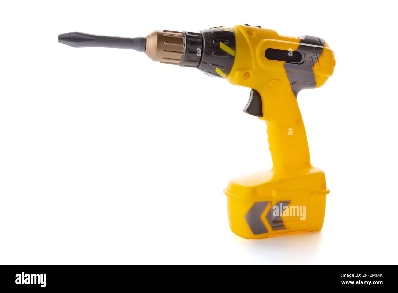 Yellow plastic toy drill screwdriver with bit isolated on white ...