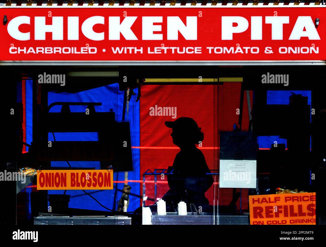 Sandy Class, with Golden Gate Foods, cooks up some gyros inside her ...