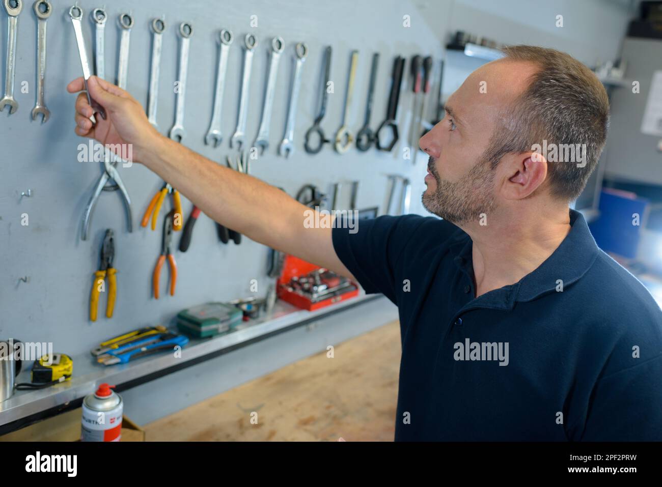 Tiding up hi-res stock photography and images - Alamy