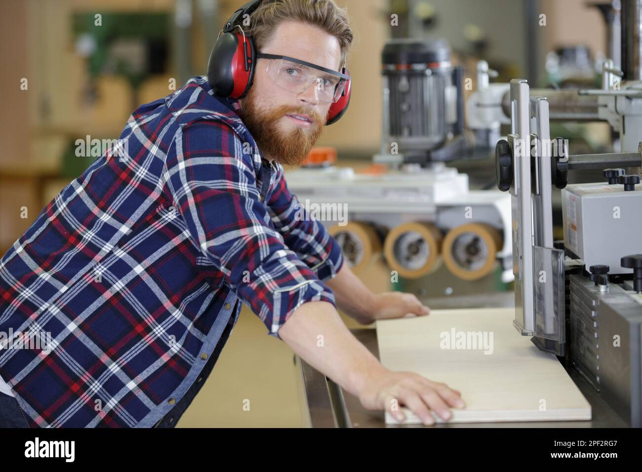 portrait of a carpenter in workshop routine Stock Photo - Alamy