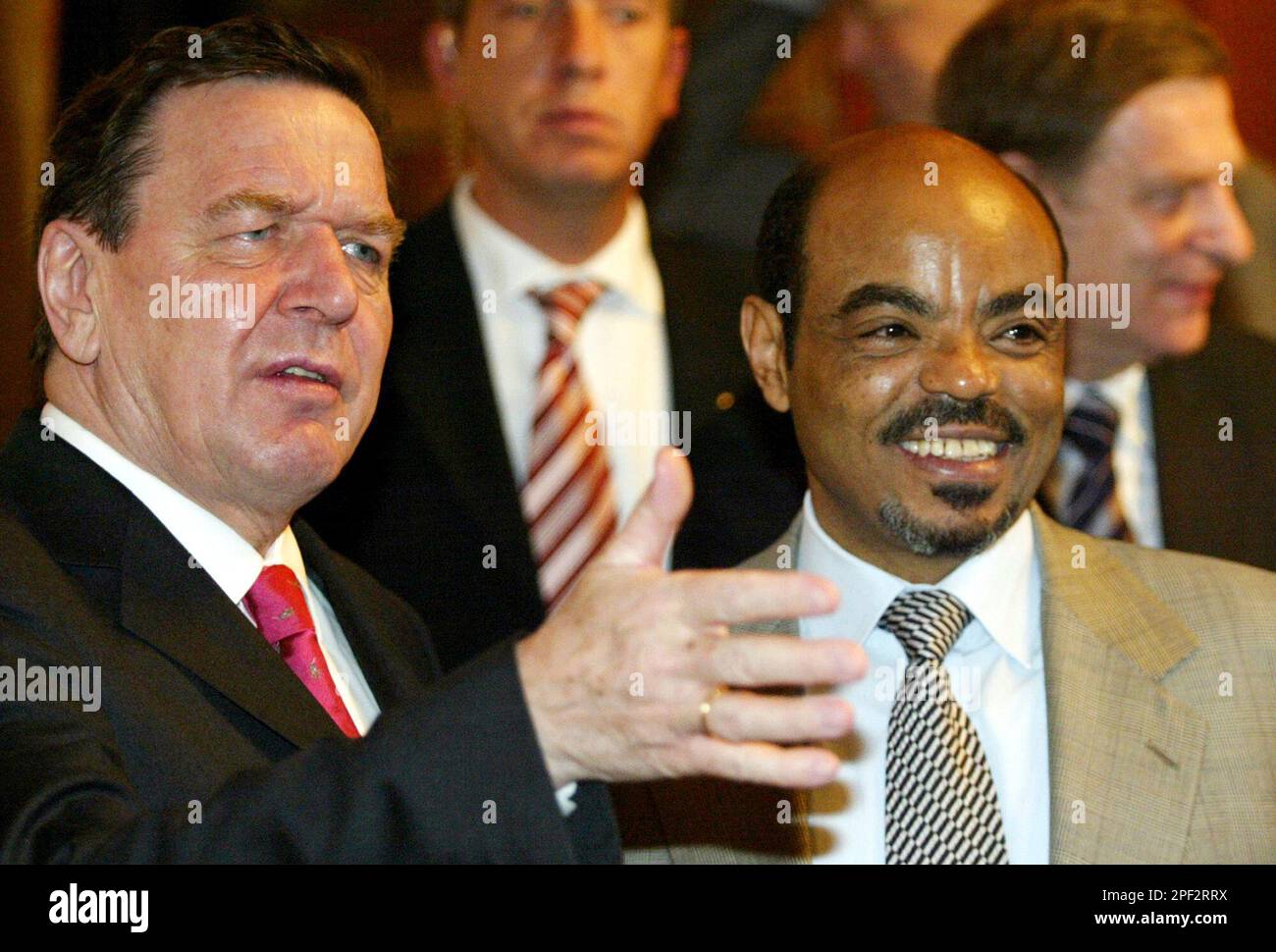 German Chancellor Gerhard Schroeder, left, gestures next to Ethiopian ...