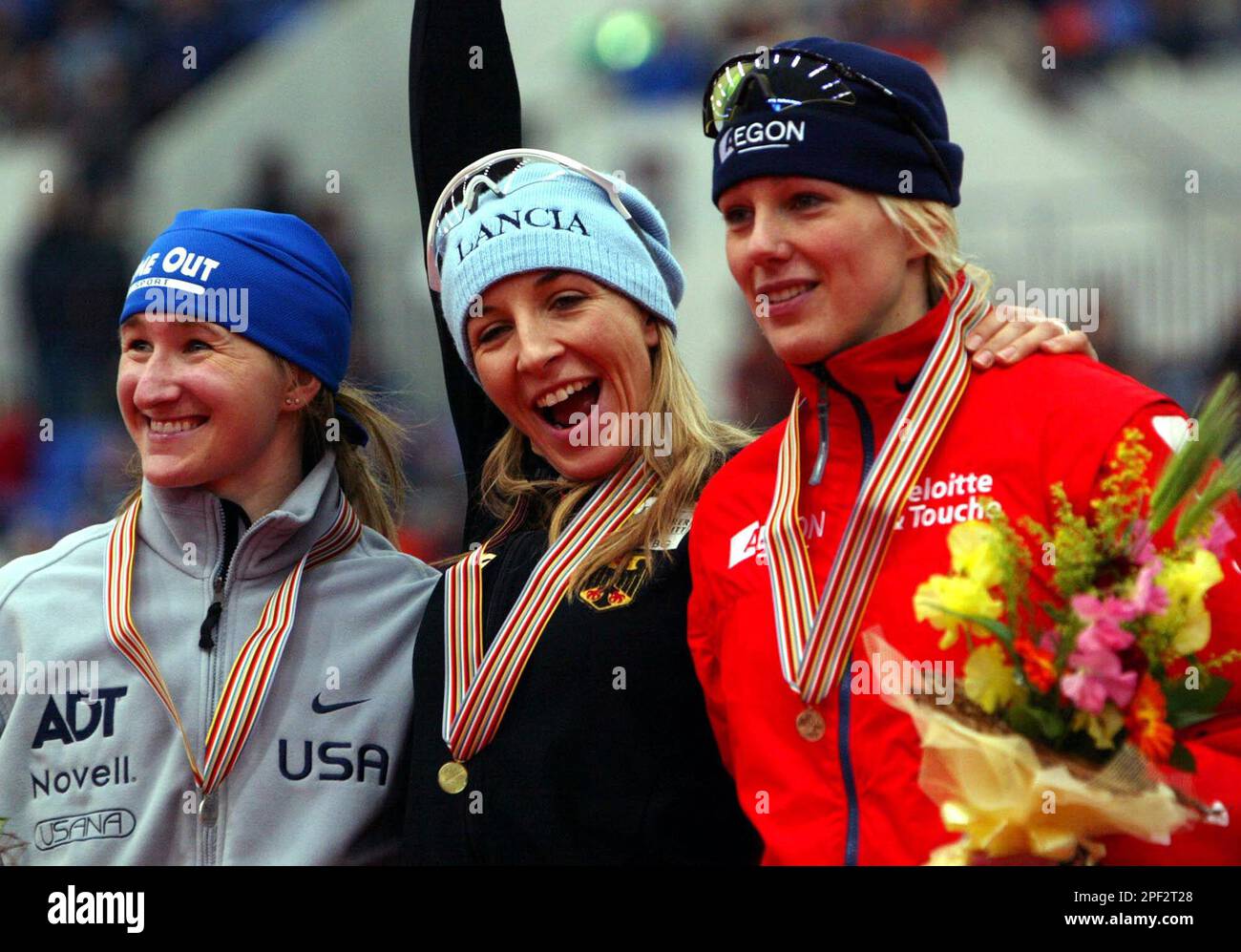 Winners of the women's 1000 meter race, from left, second place ...