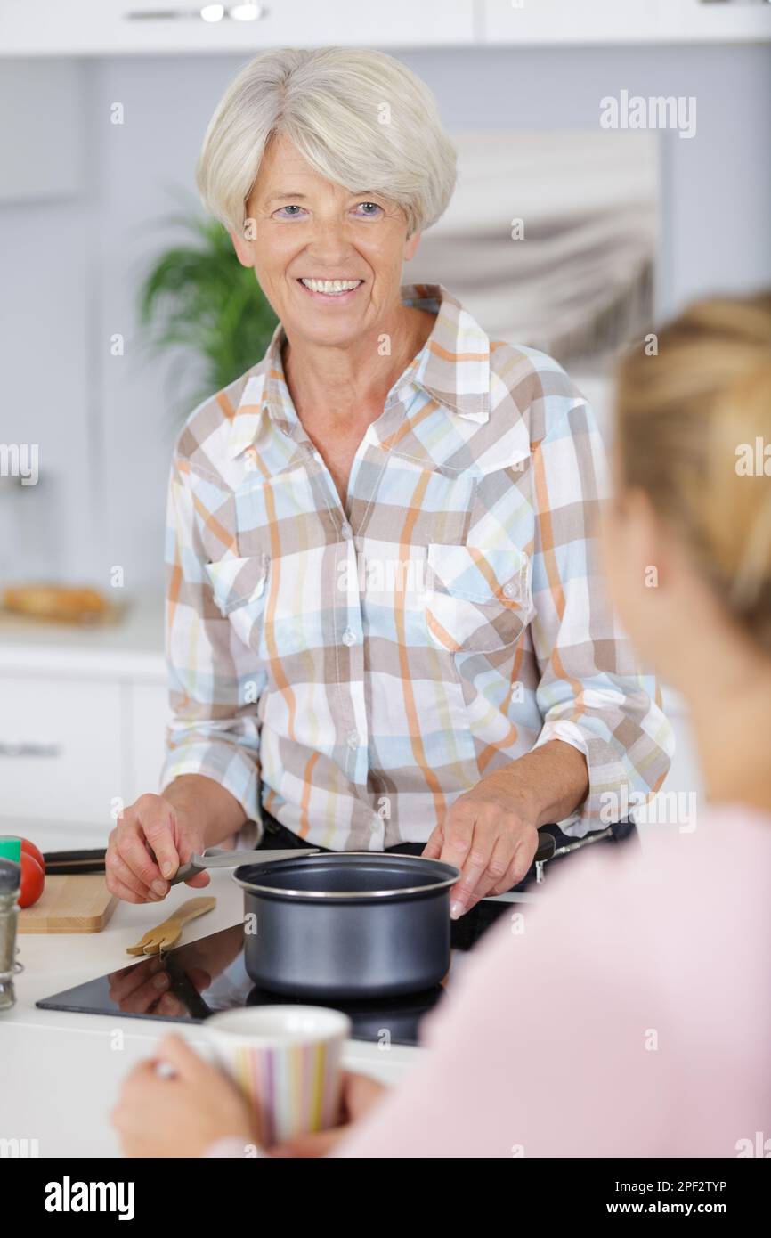 Woman boiling water on hi-res stock photography and images - Alamy